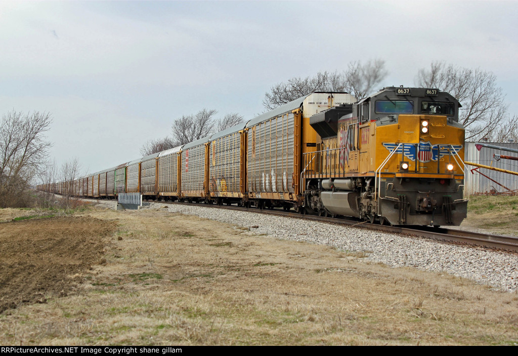 UP 8637 Leads a Ns auto train.